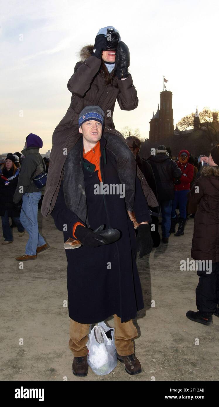 Scott Butsch gives his wife, Cristina, a lift for a better photo, as ...