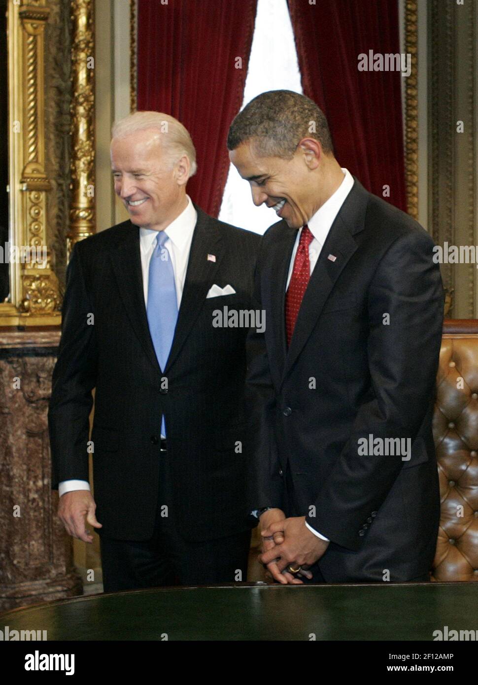 President Barack Obama stands with Vice President Joe Biden after Obama ...