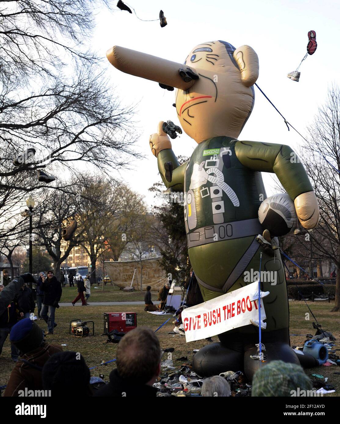 An inflated effigy of President George W. Bush served as the target of ...