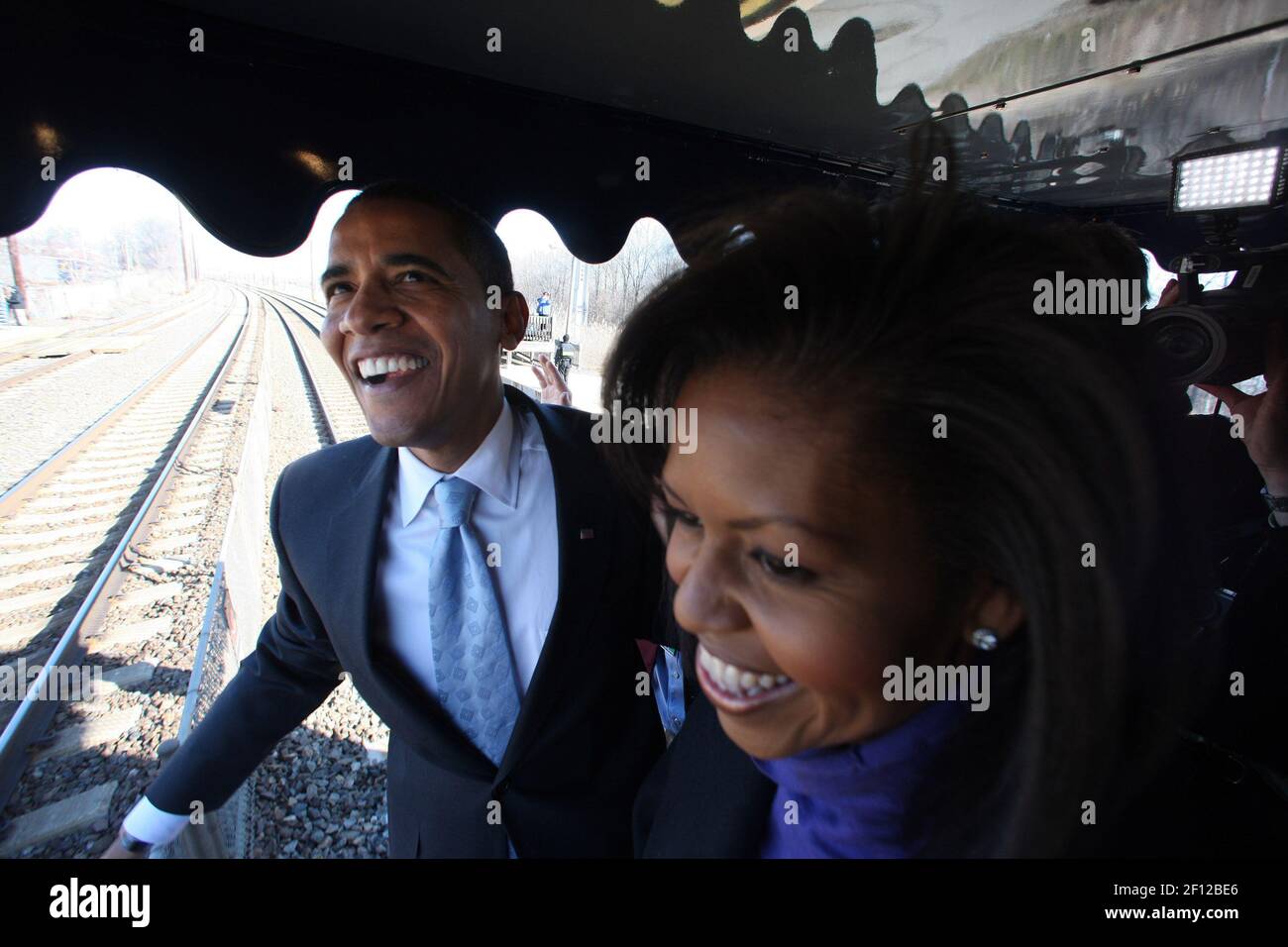 President-elect Barack Obama and his wife, Michelle Obama, stand at the ...