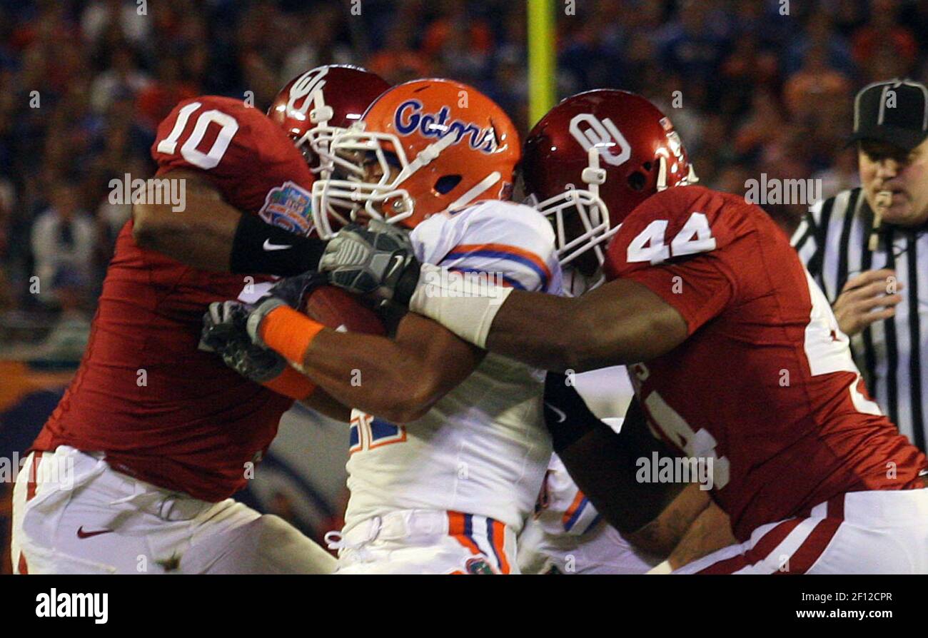 Florida running back Emmanuel Moody is stopped with no gain by the ...