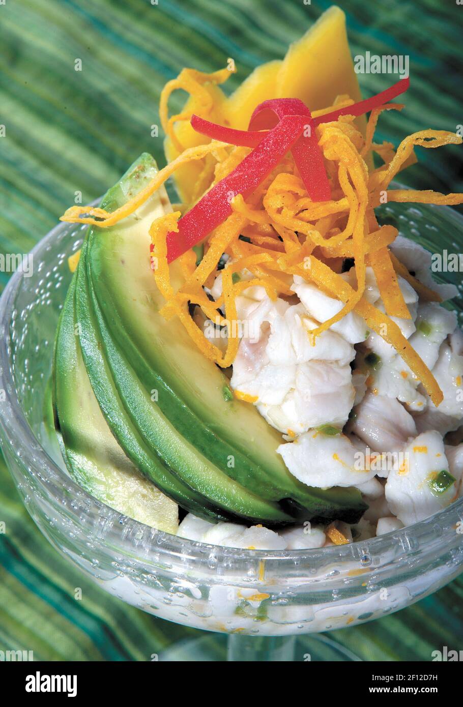 Avocado and ceviche meshes citrus-cured white fish with chunks of ...