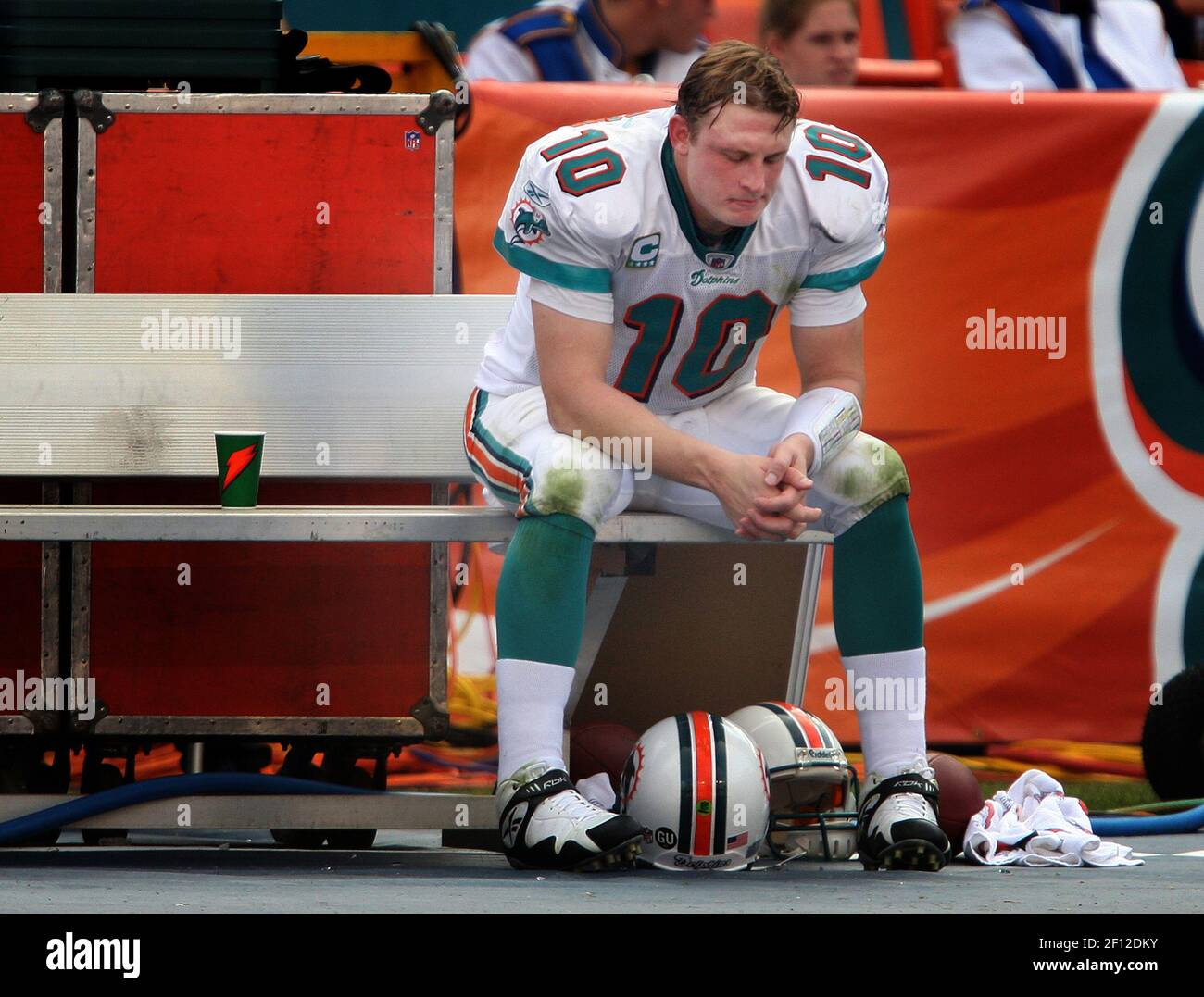 Miami Dolphins quarterback Chad Pennington sits alone after the ...