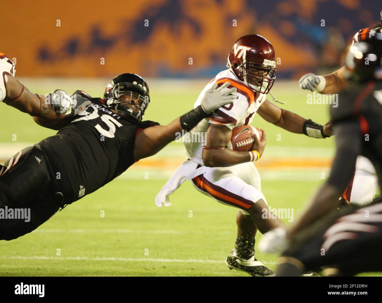 Cincinnati's Terrill Byrd reaches for Virginia Tech quarterback Tyrod ...