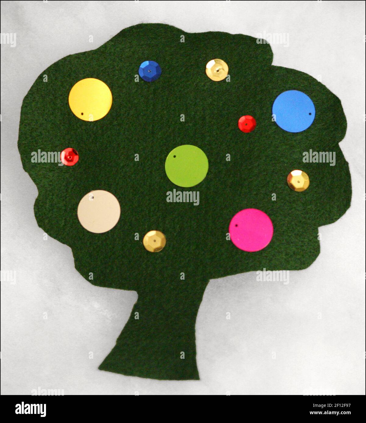 This decorated Bodhi Tree made out of felt, sequins and mylar balls ...