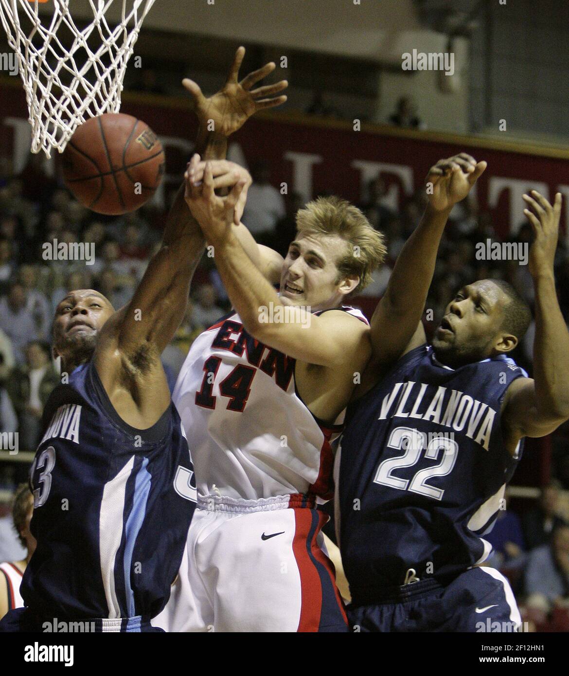 Villanova's Dante Cunningham (left) and Dwayne Anderson (22) battle ...