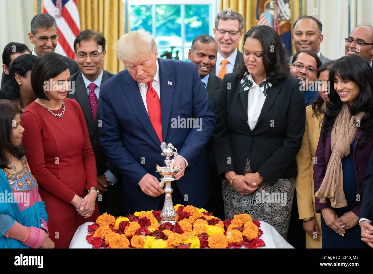 President Donald Trump is joined by guests as he participates in the ...