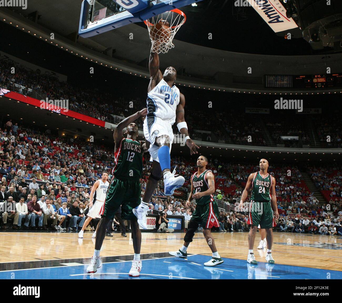 Orlando Magic guard Mickael Pietrus (20) dunks over Milwaukee Bucks ...