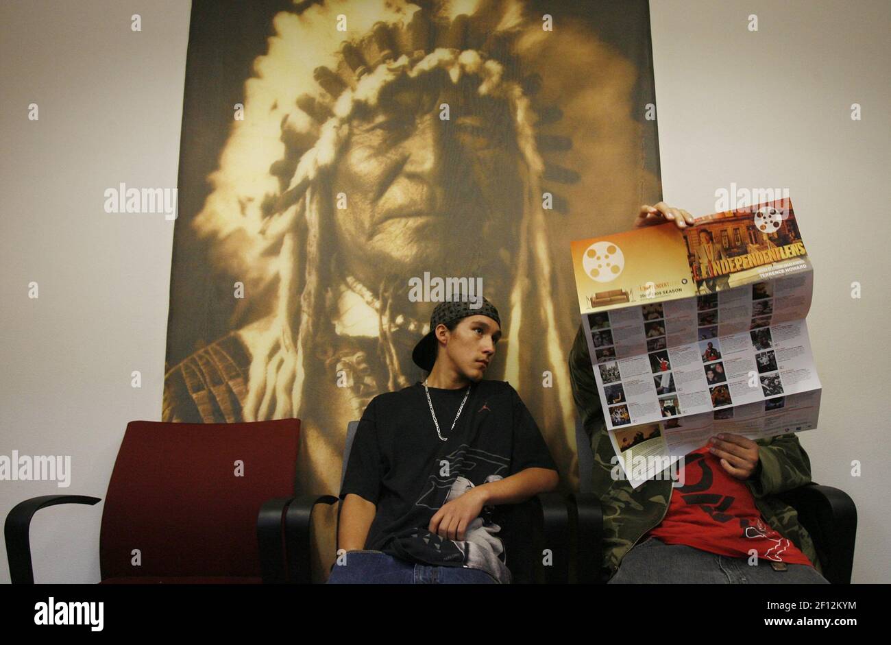 Old meets new as Cody Cayou, left, and Nick Clark, check the schedule ...