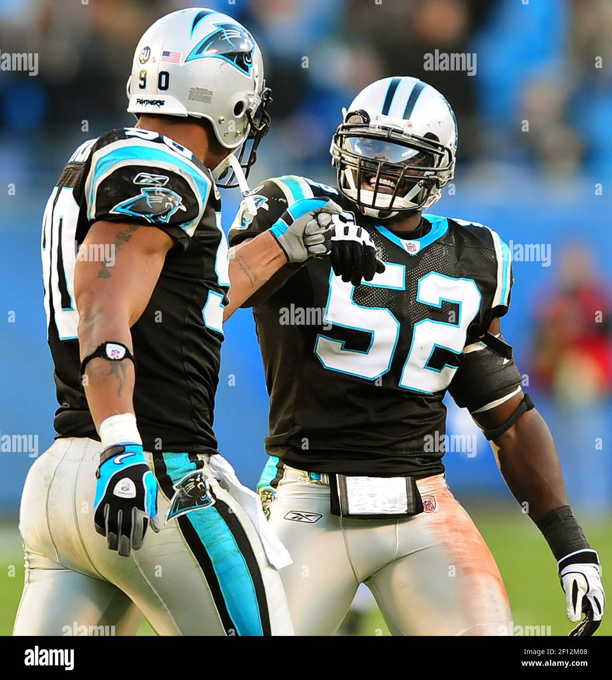 Carolina Panthers linebacker Jon Beason (52) congratulates defensive ...