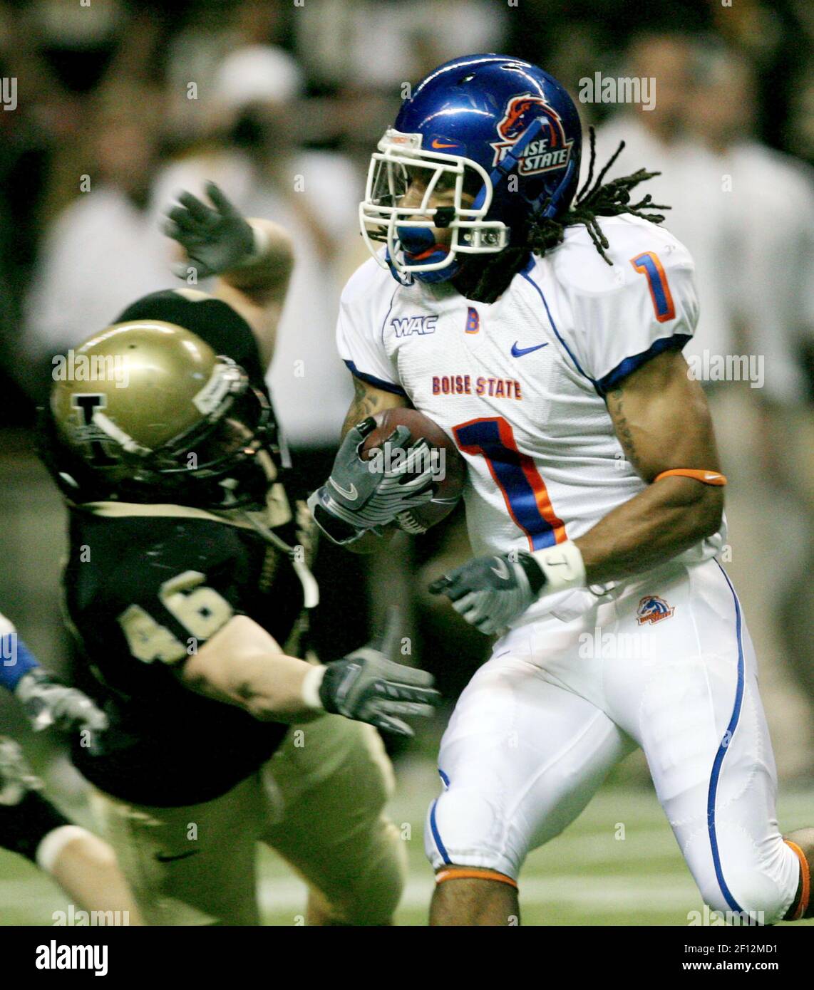 Boise State cornerback Kyle Wilson returns a punt for a touchdown in ...