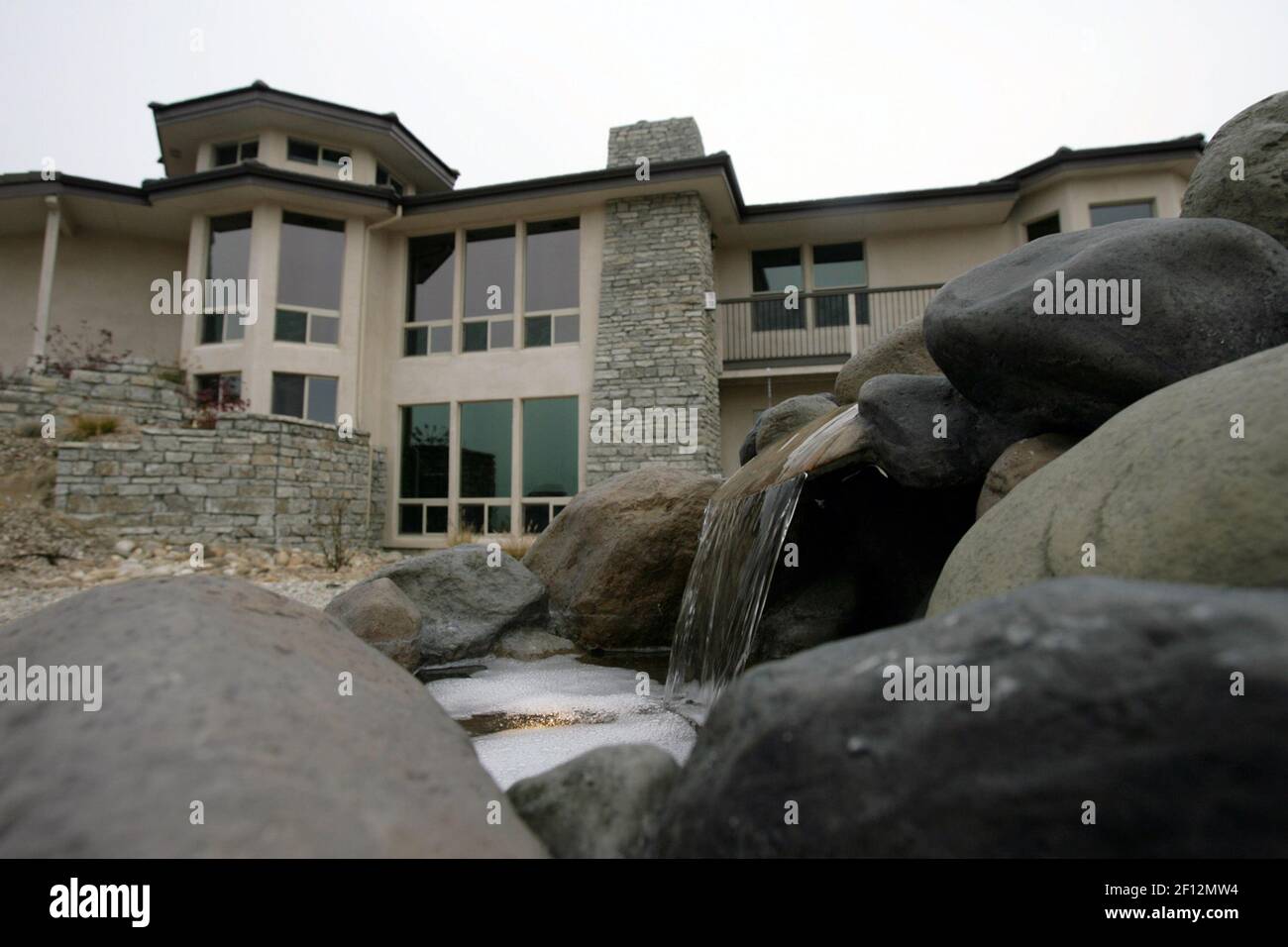 A waterfall is part of a rainwater harvesting system that Boise builder ...