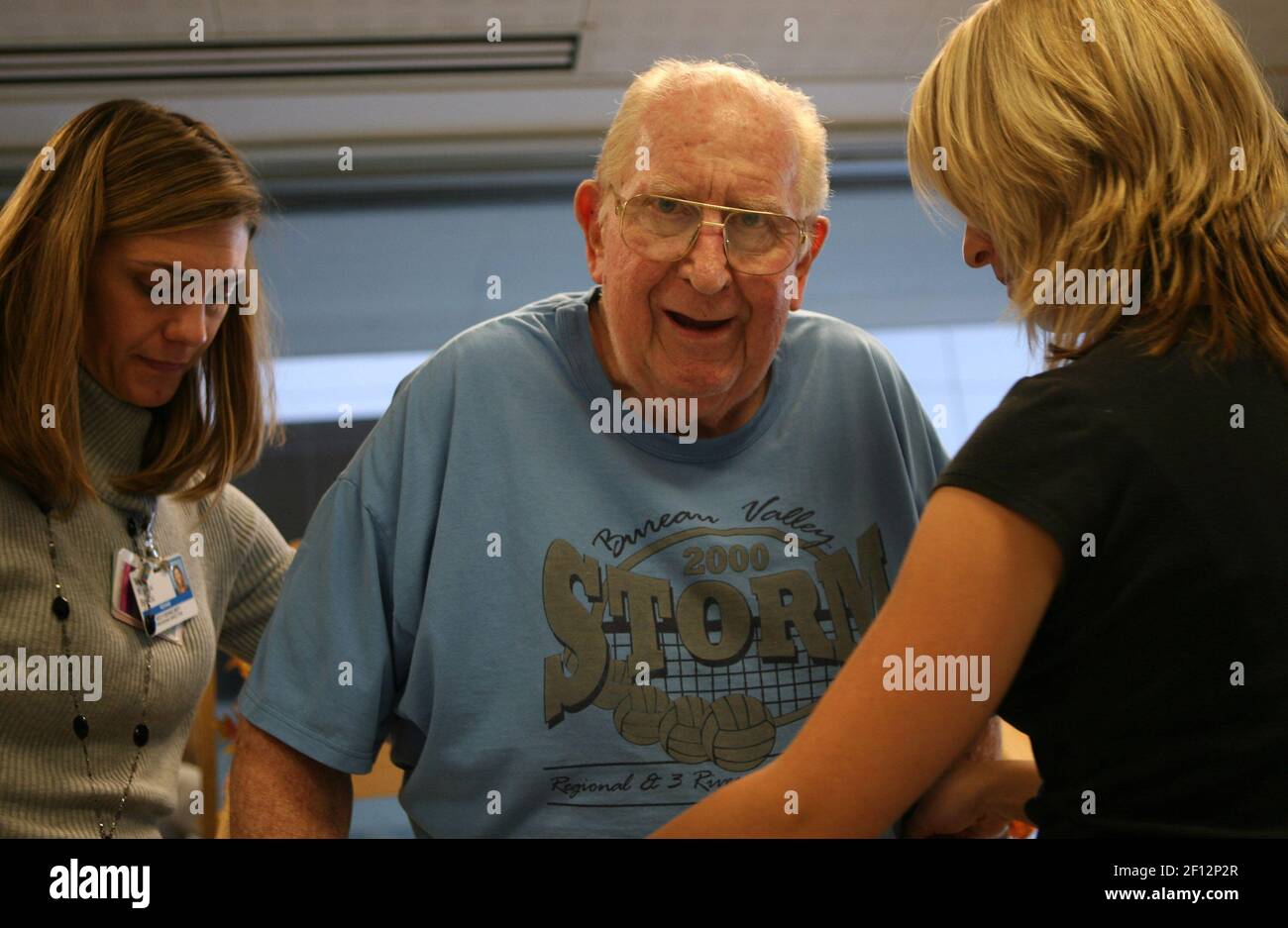 Gene Johnson, 81, breaks a smile after taking a few steps on his new ...