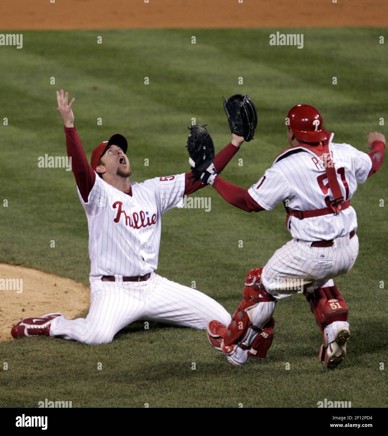 Philadelphia Phillies closer Brad Lidge (left) and catcher Carlos Ruiz ...