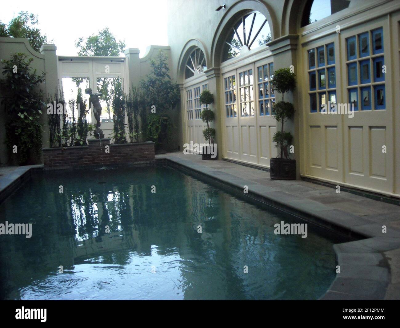 The pool area at the Bienville House seems transported straight from ...