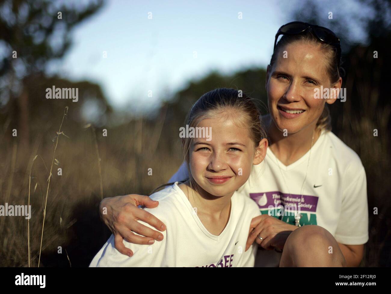 Robyn Froerer, right, and her daughter, Isabelle Jane Froerer, 10, pose ...