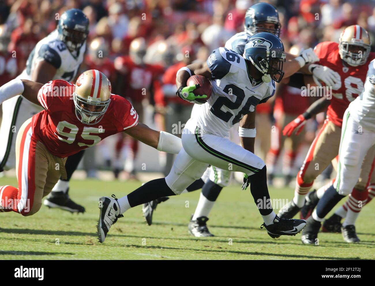 Seattle Seahawks' Josh Wilson (26) runs past San Francisco 49ers' Tully ...