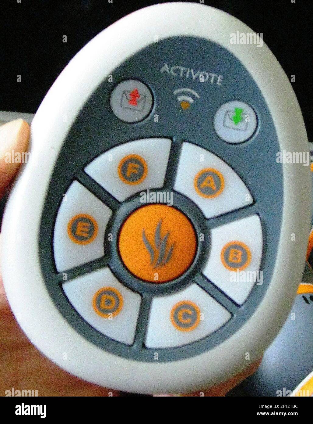Activotes are egg-shaped grey and orange handheld devices that allow ...