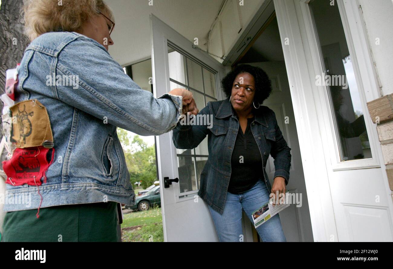 Marcia Phillips receives a fist bump from Susan Woehrle after Phillips ...