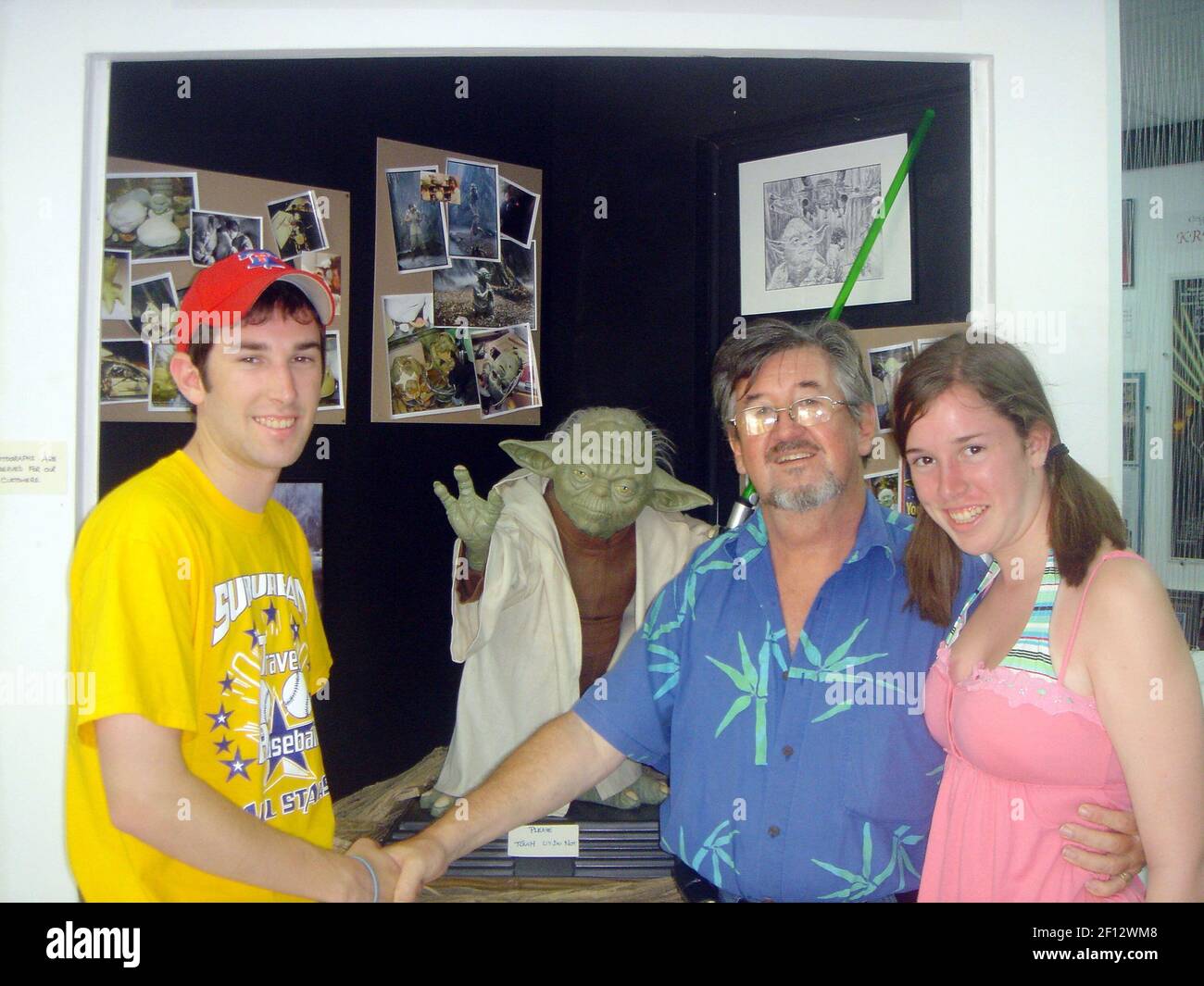 Eric Reed, far left, with Rebecca, right, poses for portrait with Nick ...