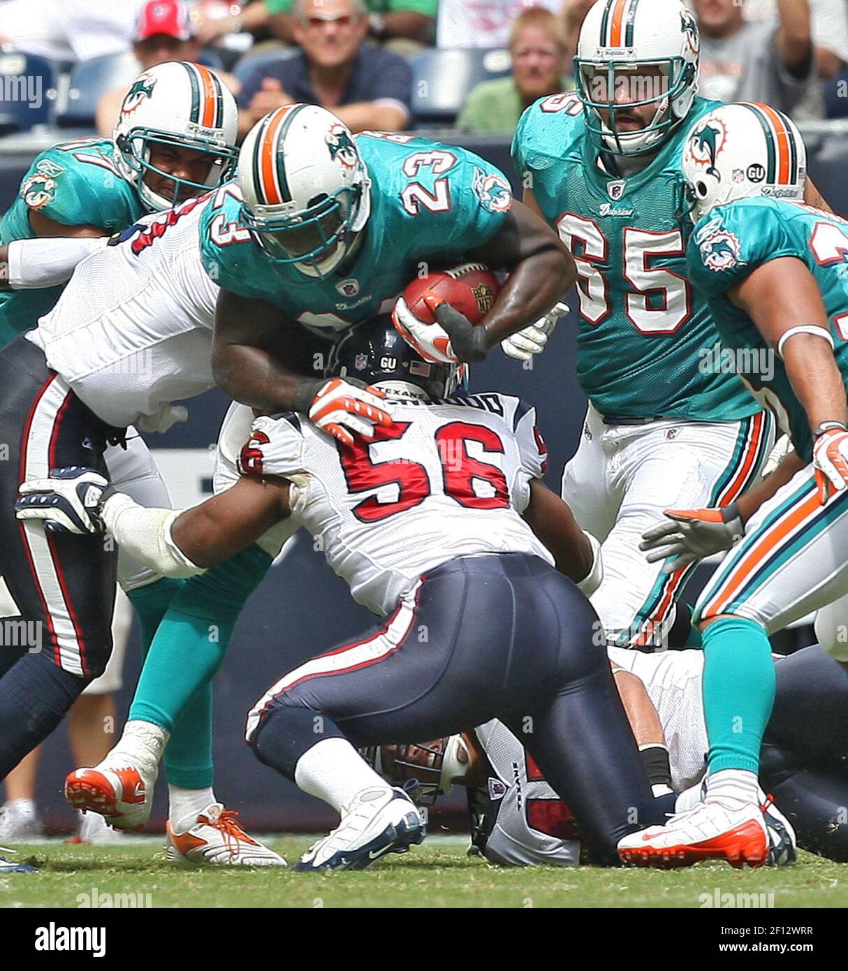 Miami Dolphins' Ronnie Brown runs the ball during the second quarter ...
