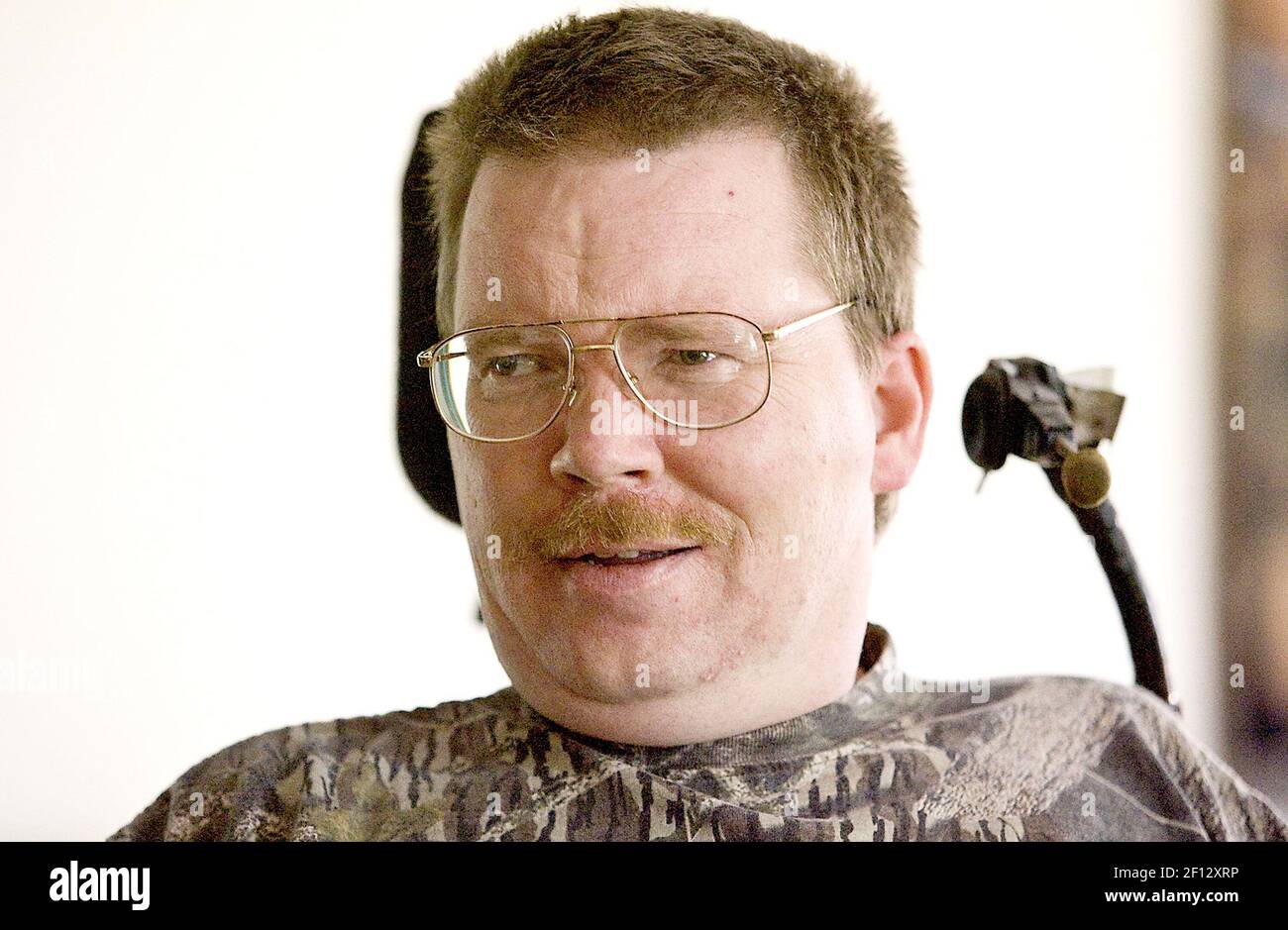 Don Christensen, of Webster, Wisconsin, tells a hunting story from his ...