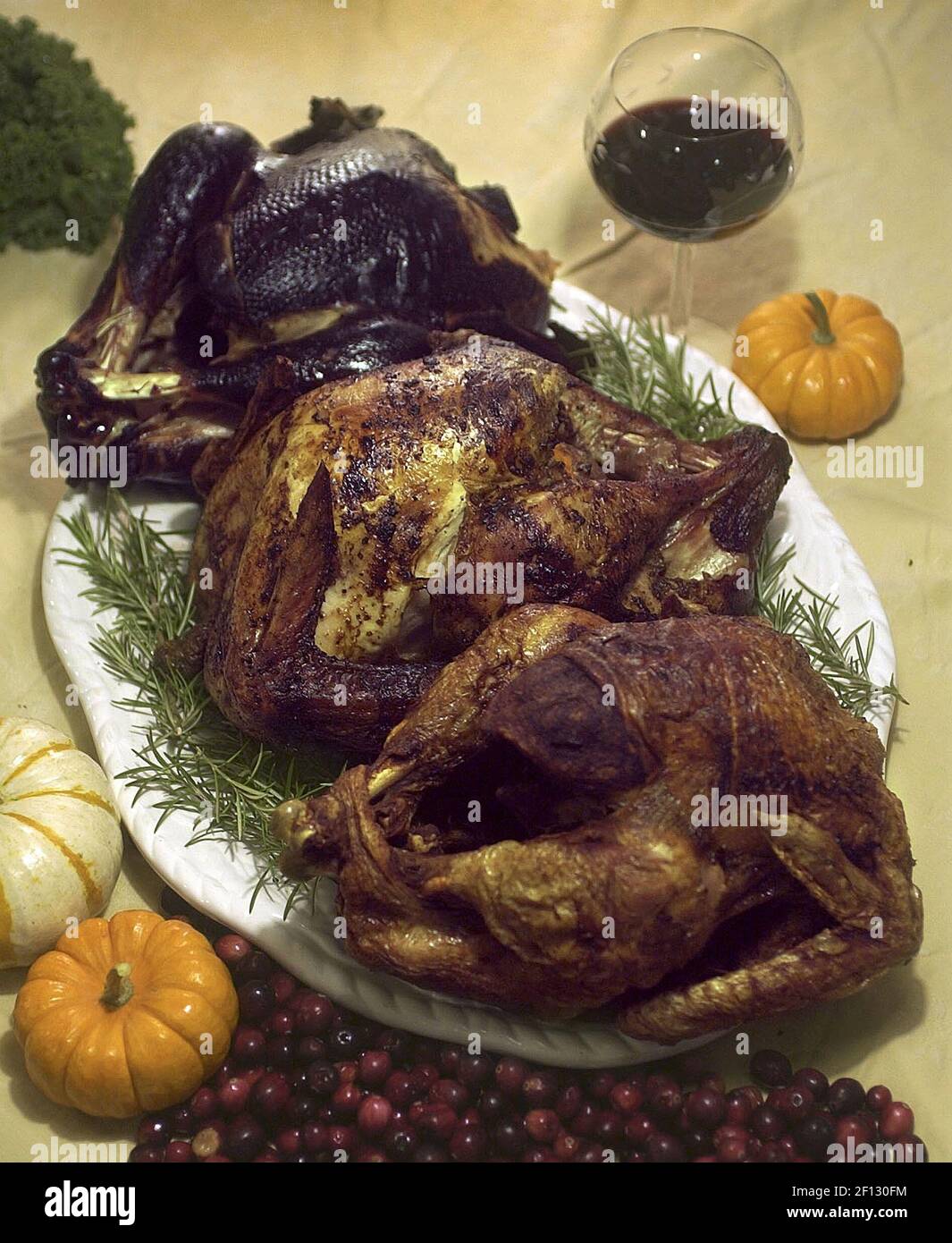 Three turkeys cooked three different ways. From top: smoked, rotisserie ...