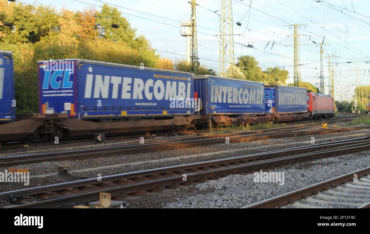 Lorry trailers being transported on railway goods wagons, Cologne ...