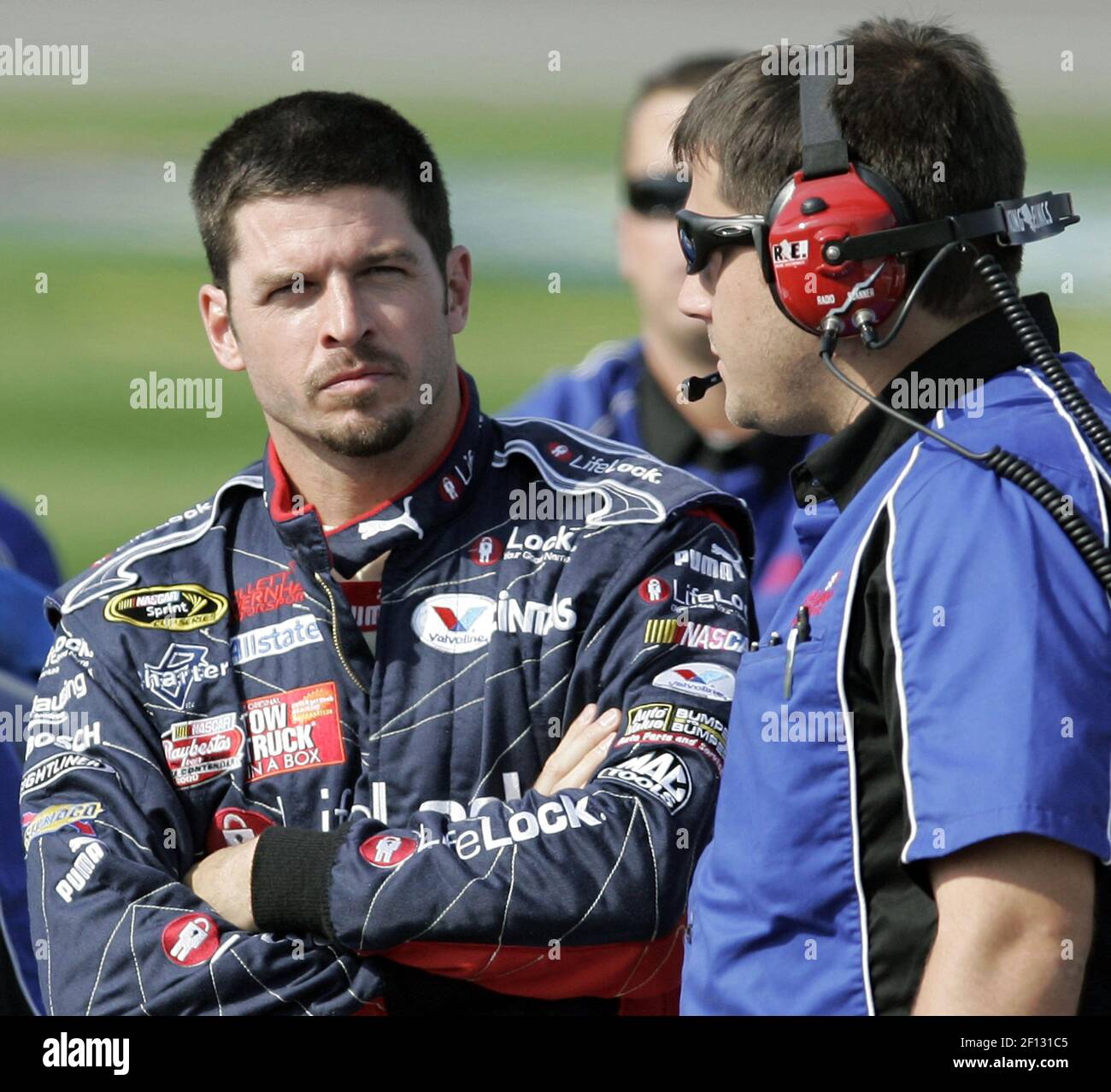 NASCAR driver Patrick Carpentier waits during qualifying the NASCAR ...