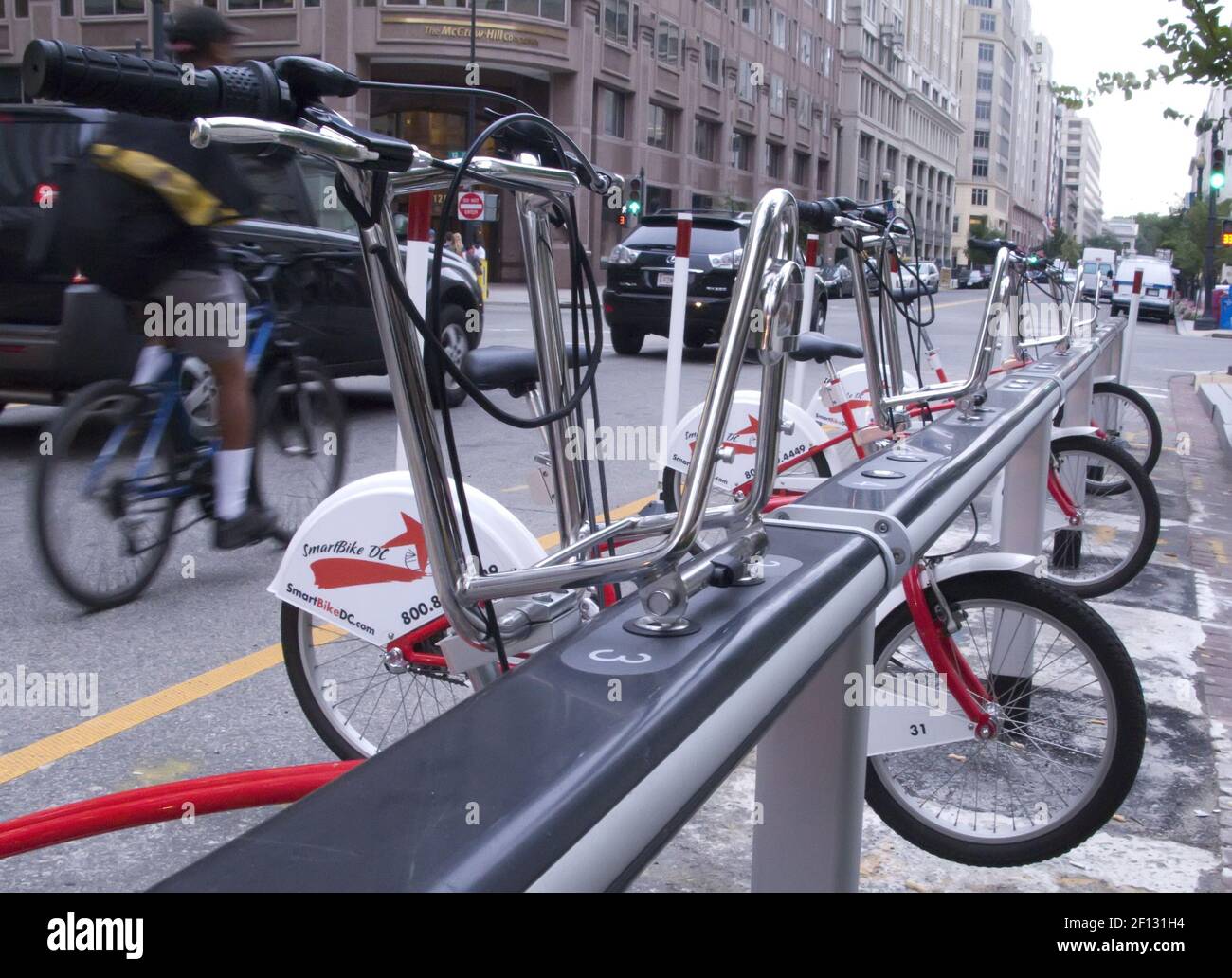 Bikes from a bike sharing program sit at a stand in downtown Washington ...