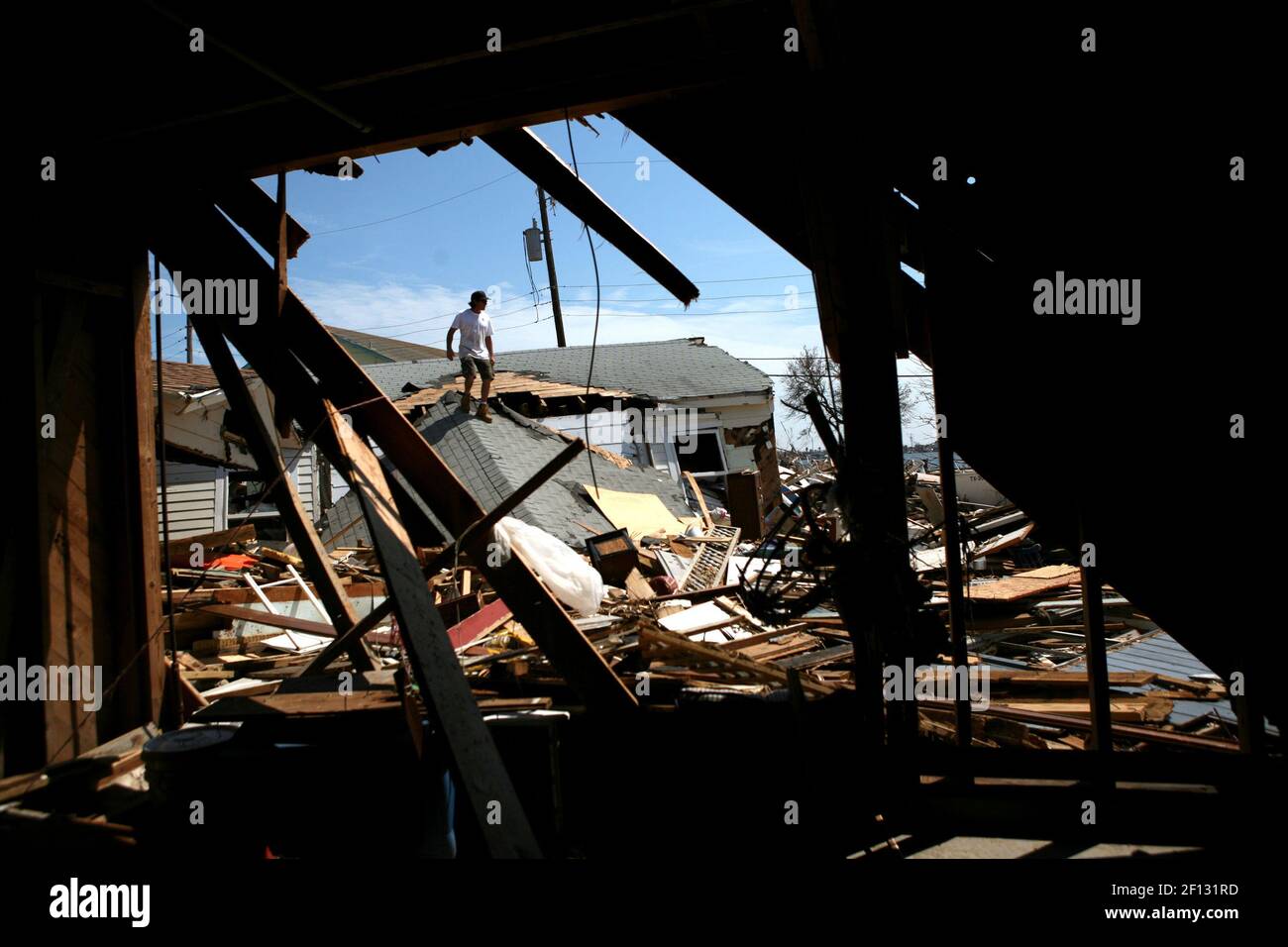 Rusty Vann gets a high view as he tries to find his safe among the ...