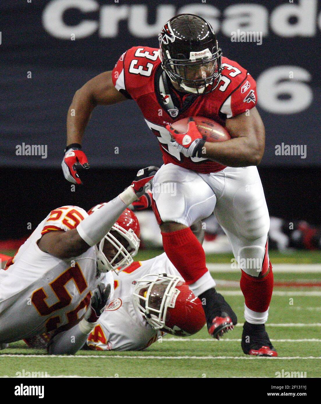 Atlanta Falcons running back Michael Turner (33) breaks free from the ...