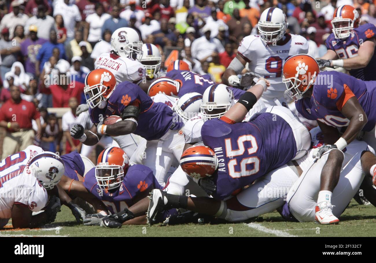 Clemson's James Davis drives through the line of scrimmage against ...