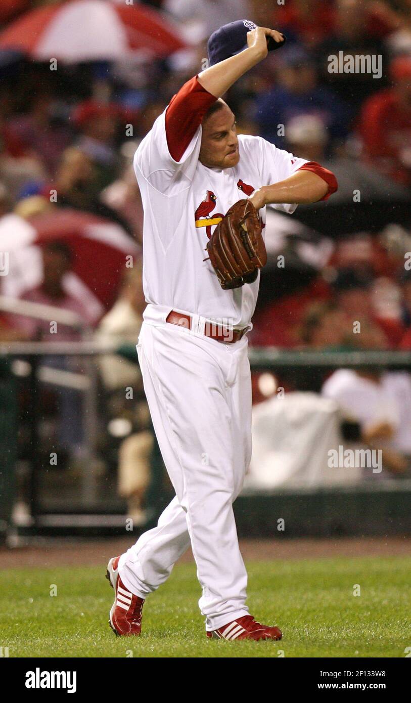 St. Louis Cardinals relief pitcher Kyle McClellan wipes his face after ...