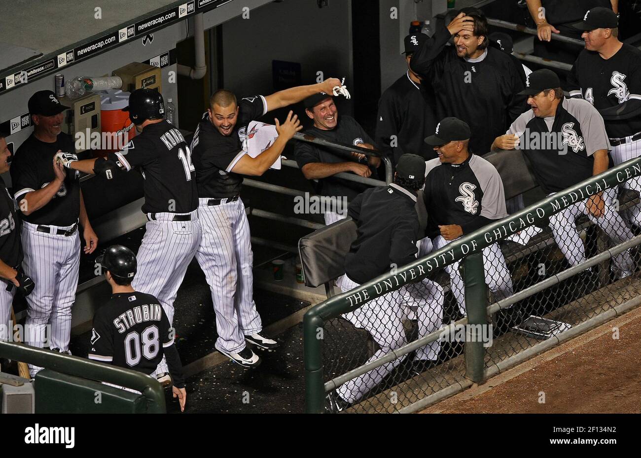 Chicago White Sox's Nick Swisher body bumps with Paul Konerko after ...