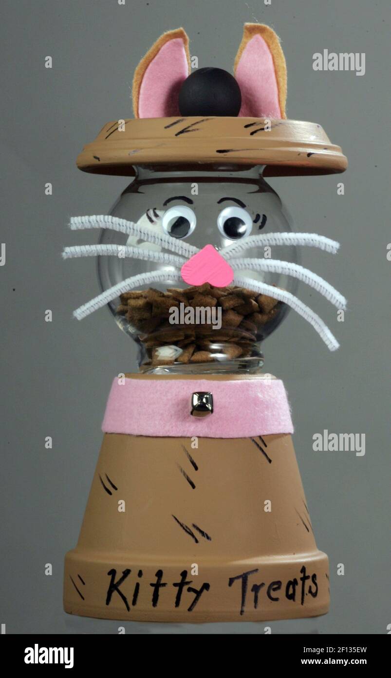 Make this kitty treat jar to hold treats for your pampered feline ...