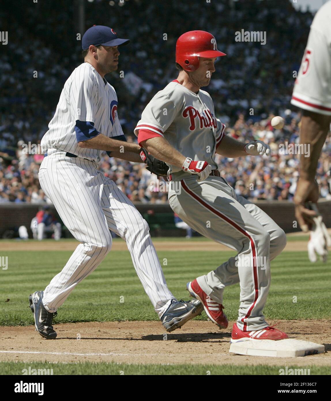 Philadelphia Phillies base runner Chase Utley beats Chicago Cubs ...