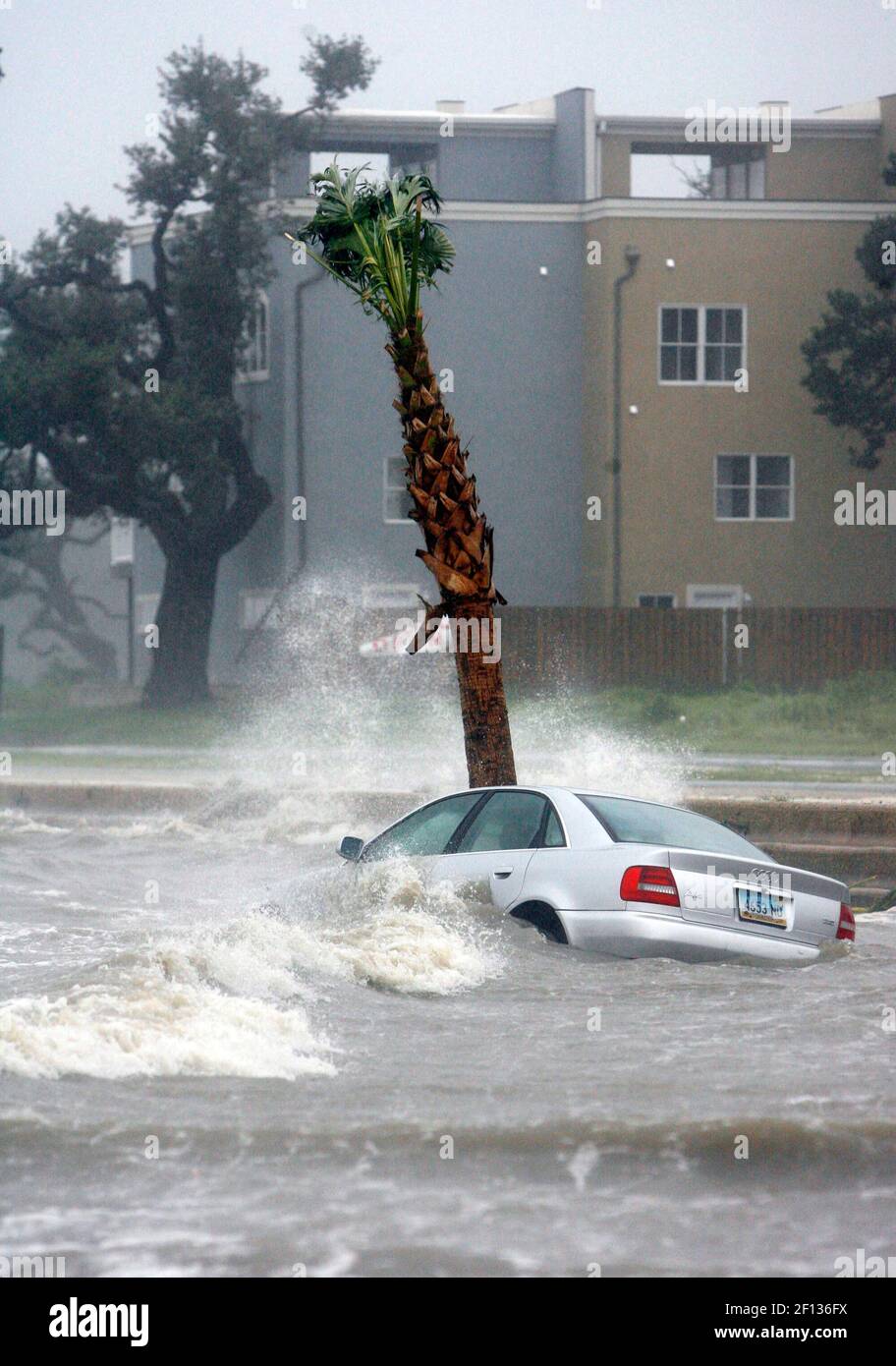 A car floats in the storm surge of Hurricane Gustav at Ken Combs Pier ...