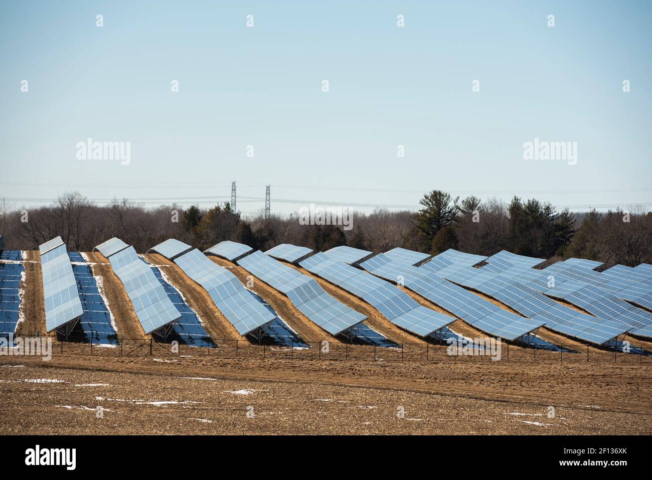 Port Hope Solar Farm, with pylons in the background carrying power ...