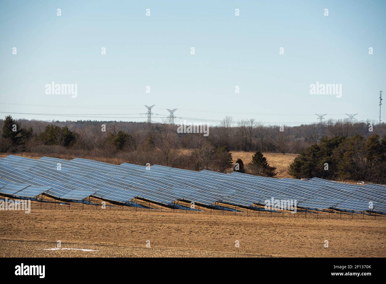 Port Hope Solar Farm, with pylons in the background carrying power ...