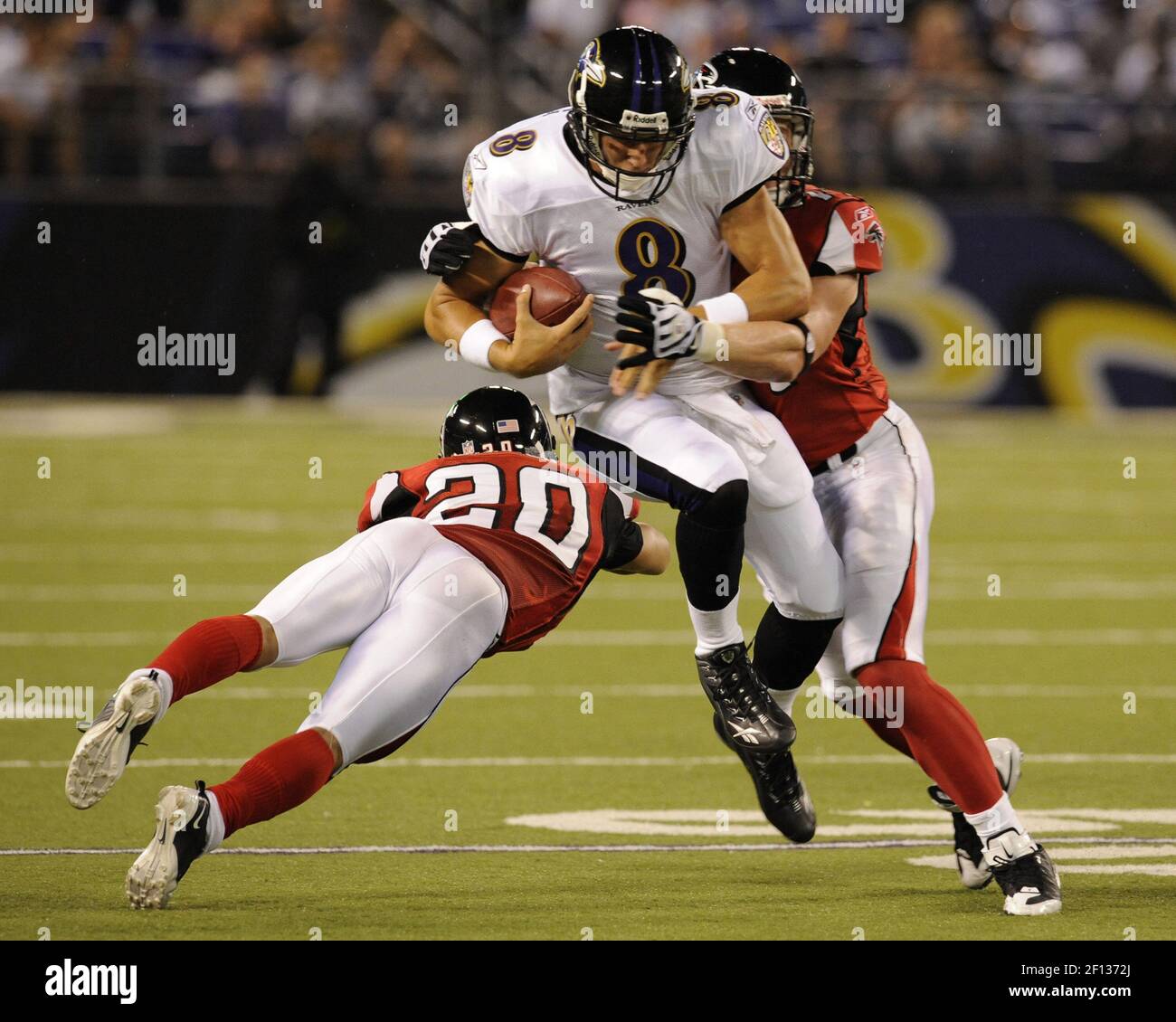 Baltimore Ravens quarterback Casey Bramlet gets sandwiched between ...