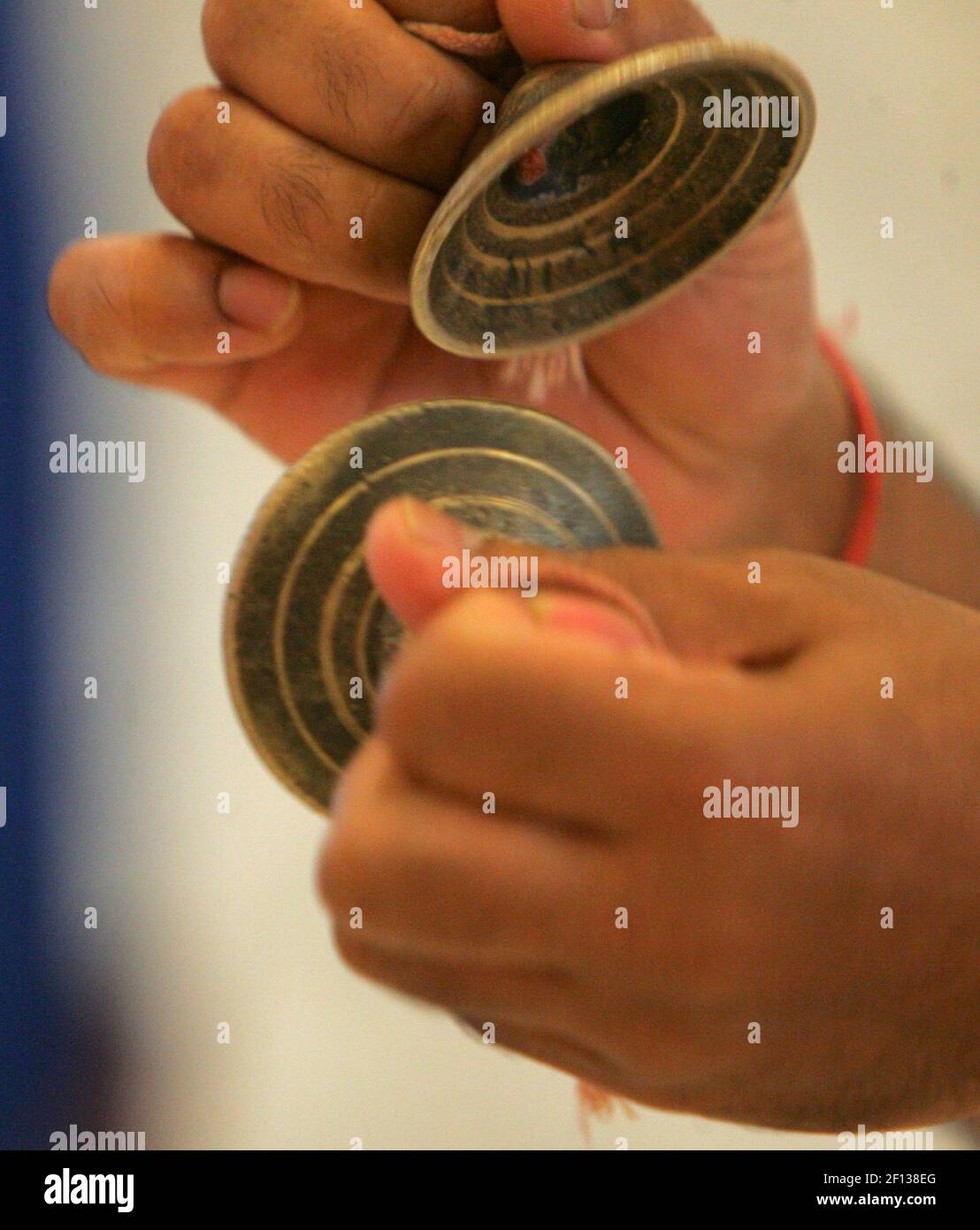 Hand symbols called karatalas are played during a Wednesday evening ...