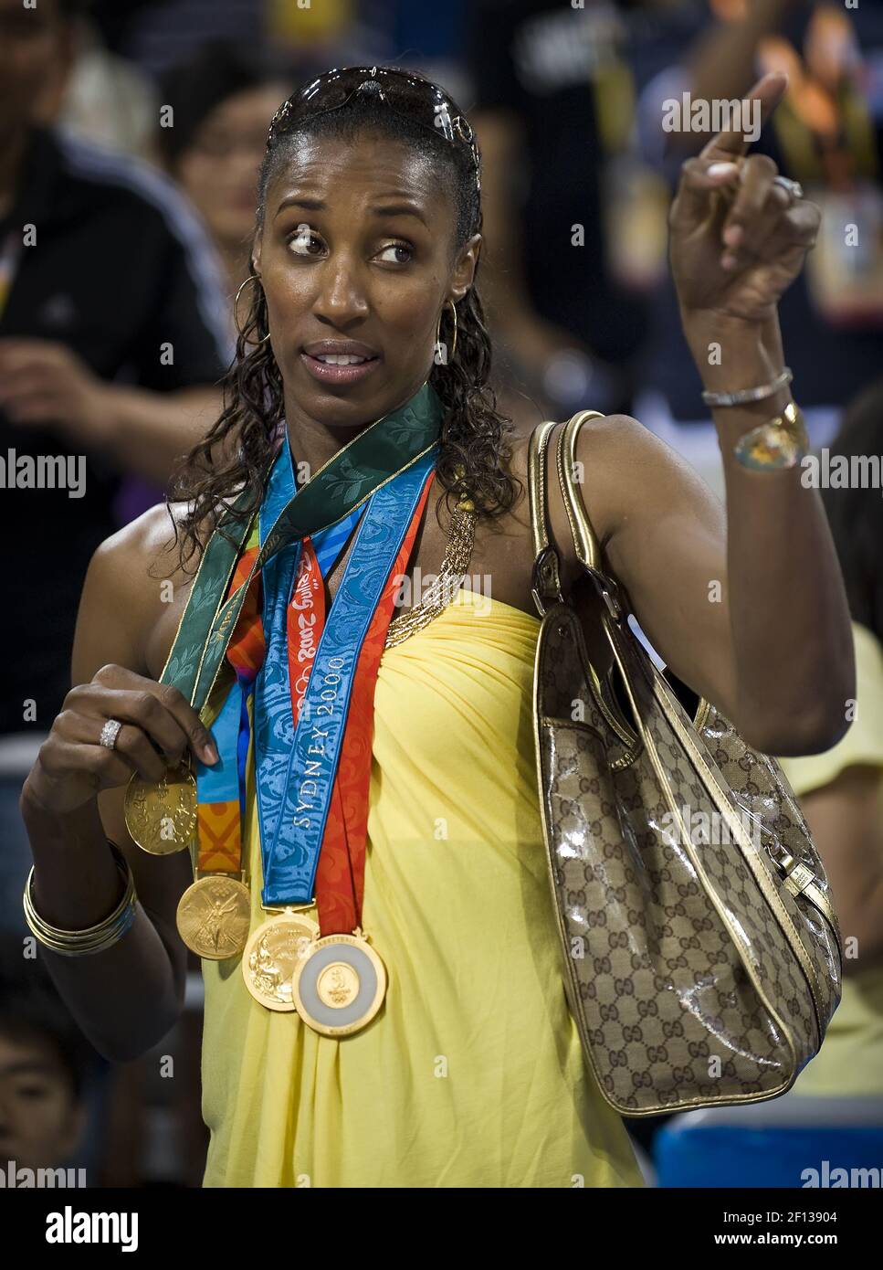 Lisa Leslie of the United States women's basketball team wears her gold ...