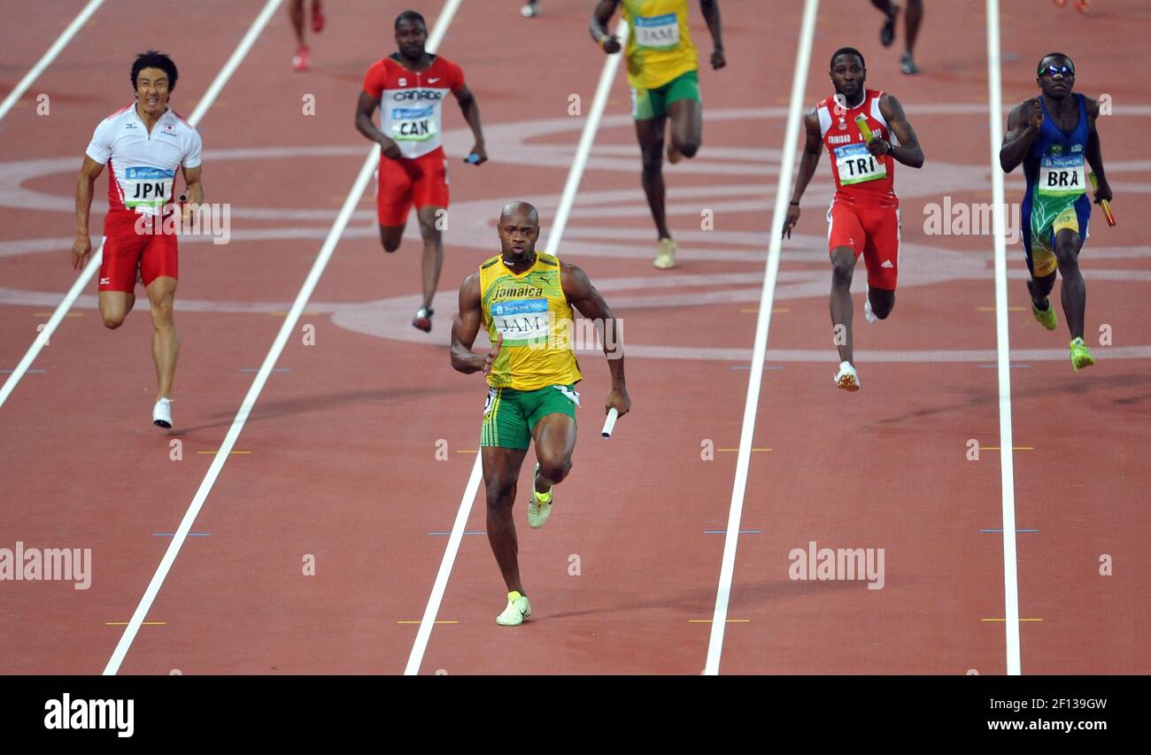 Usain Bolt of Jamaica anchors the 4x100-meter relay team to gold on ...