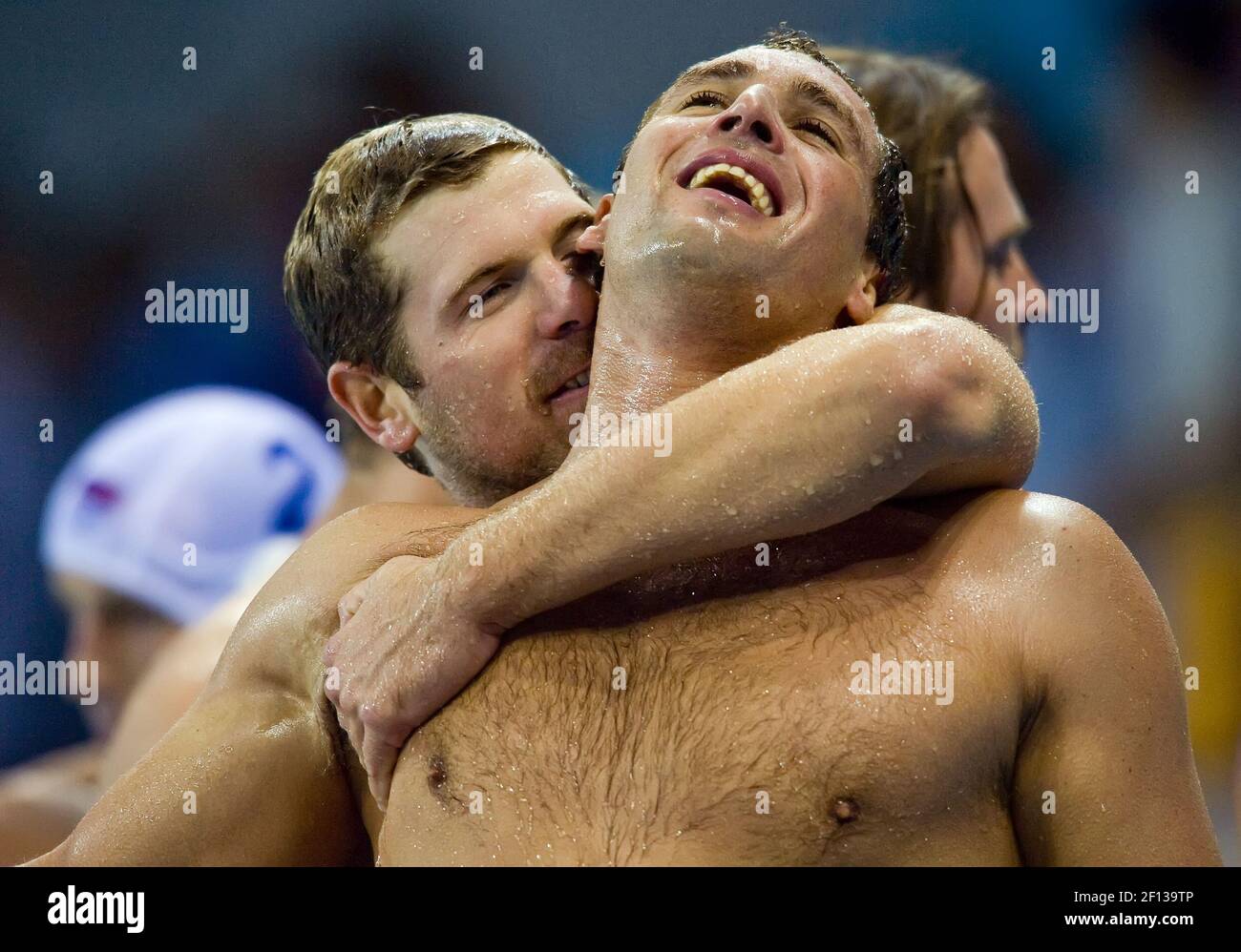 Merrill Moses of the United States celebrates with a teammate after a ...