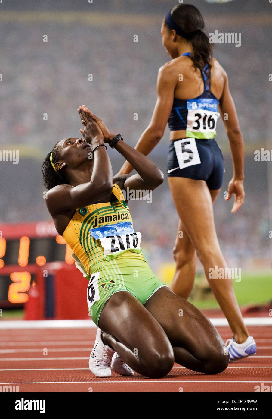 Kerron Stewart of Jamaica celebrates after winning bronze in the 200 ...