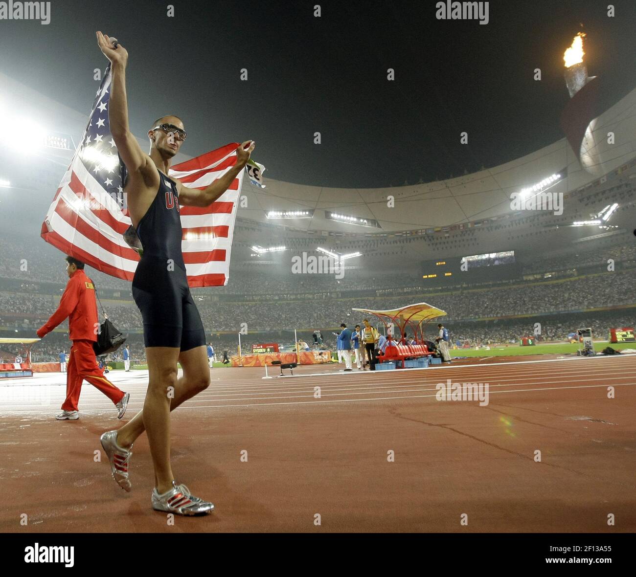 Silver medalist Jeremy Wariner of the United States walks around the ...