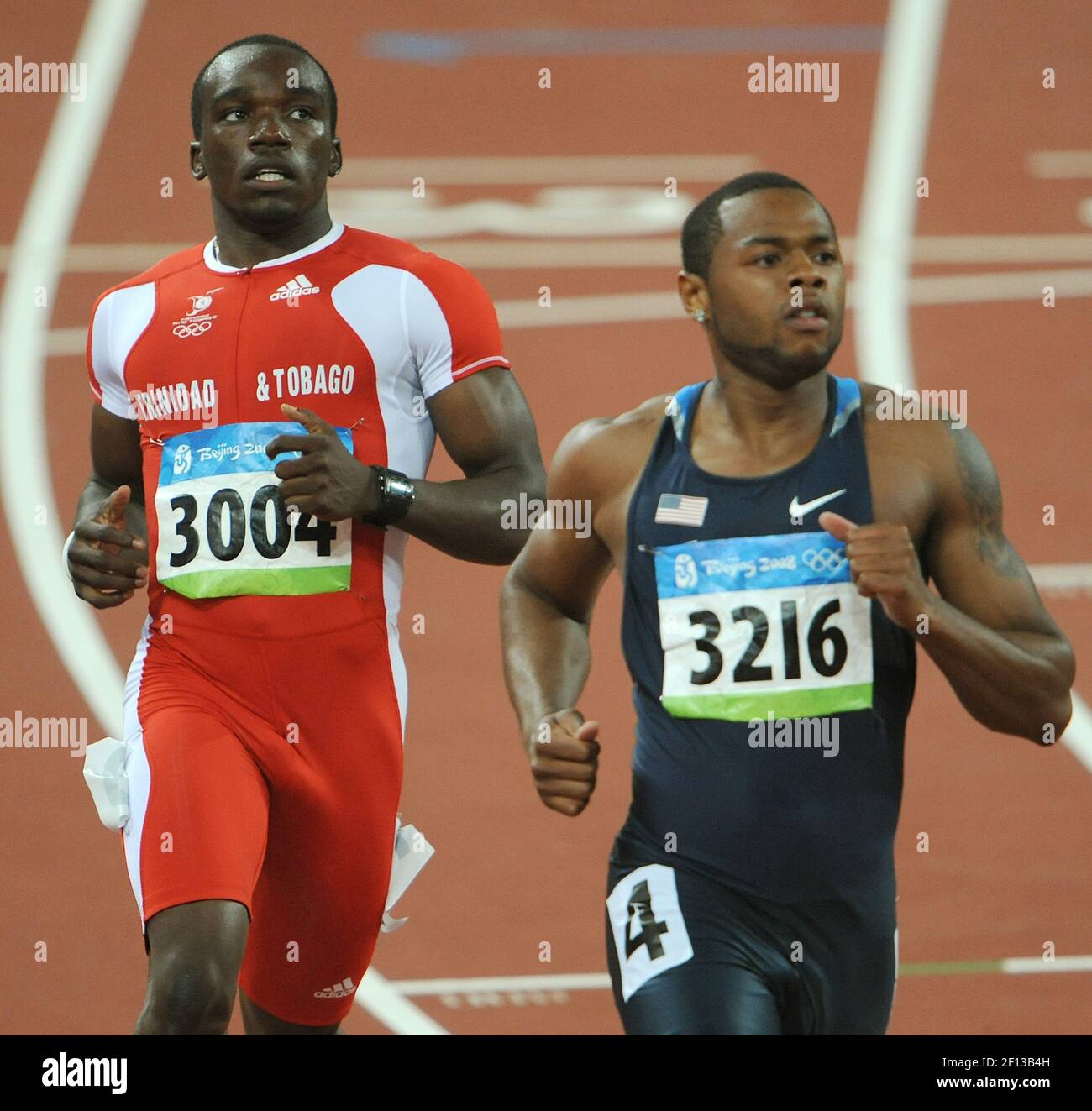 Mikel Thomas of Trinidad and Tobago, left, and David Payne of the ...