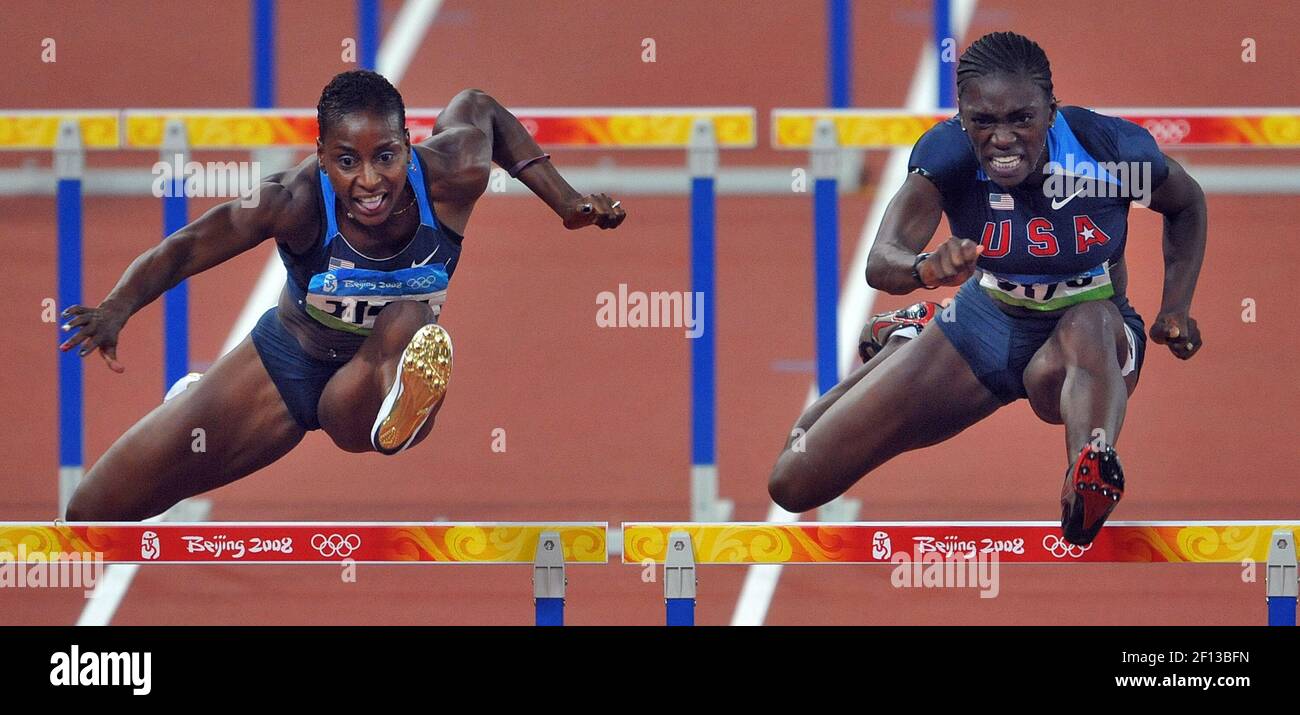 Damu Cherry, left, and Dawn Harper of the United States compete in a ...