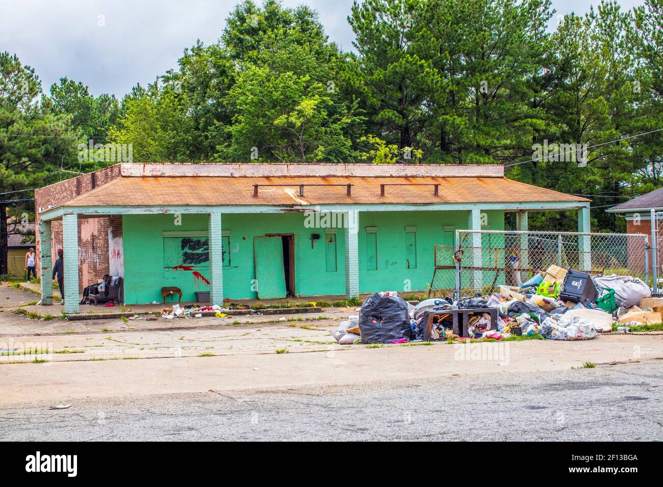 Decatur, Ga / USA - 07 07 20: Urban landscape with trash, people and an ...